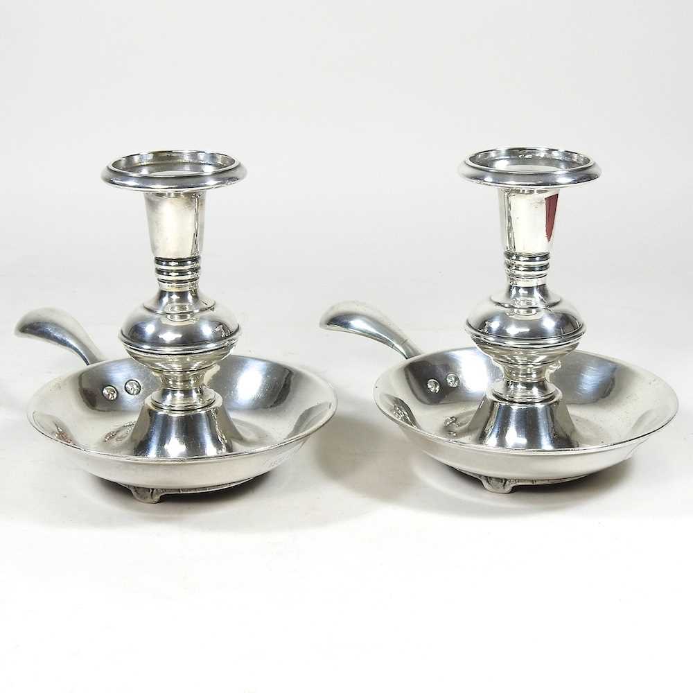 Lot 617 - A pair of chambersticks