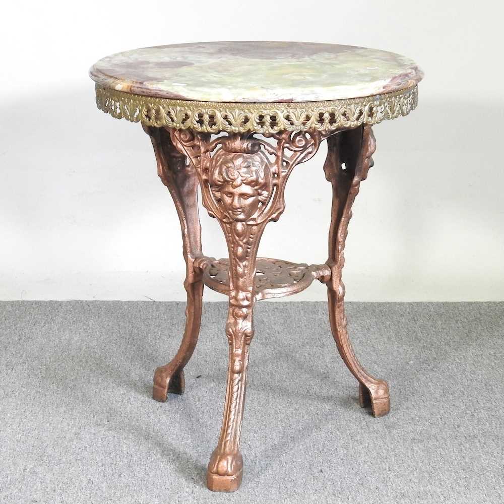 Lot 111 - A marble top pub table, on a painted metal