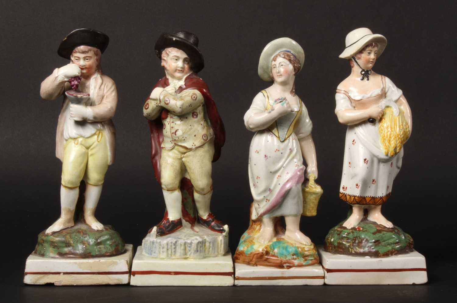Lot 125 - A set of Staffordshire pearlware figures,