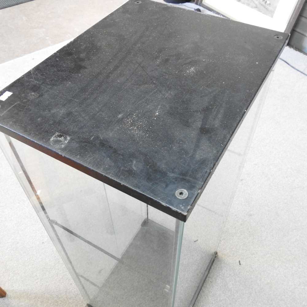Lot 483 - A glass display cabinet, 47cm wide, together