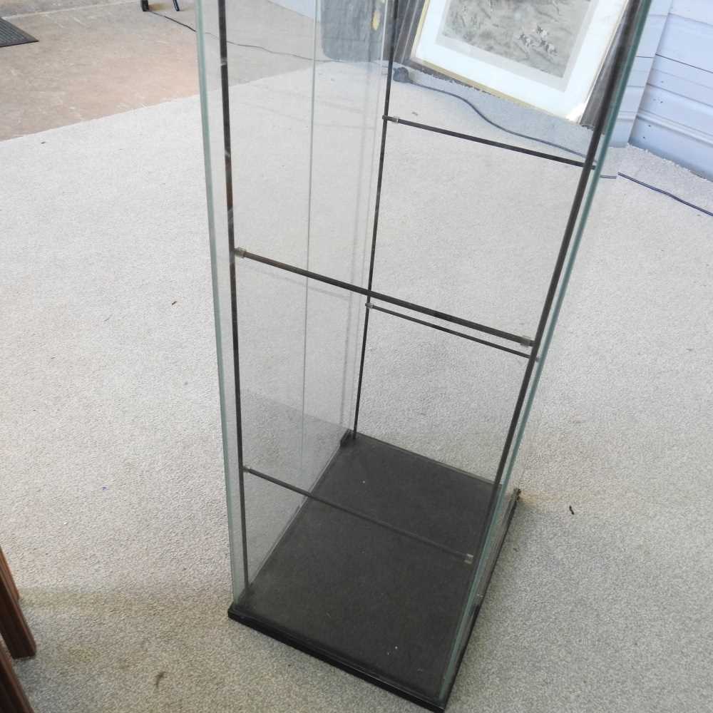 Lot 483 - A glass display cabinet, 47cm wide, together