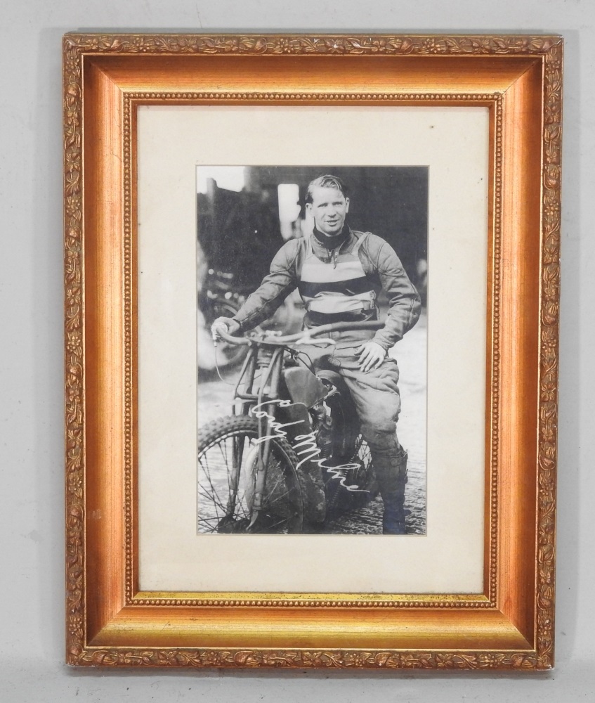 Lot 604 - A black and white signed photograph of