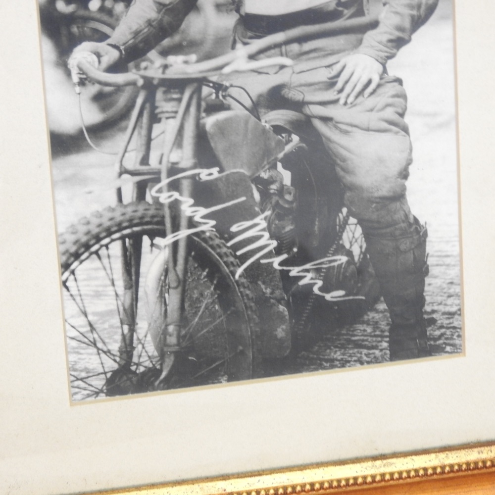 Lot 604 - A black and white signed photograph of